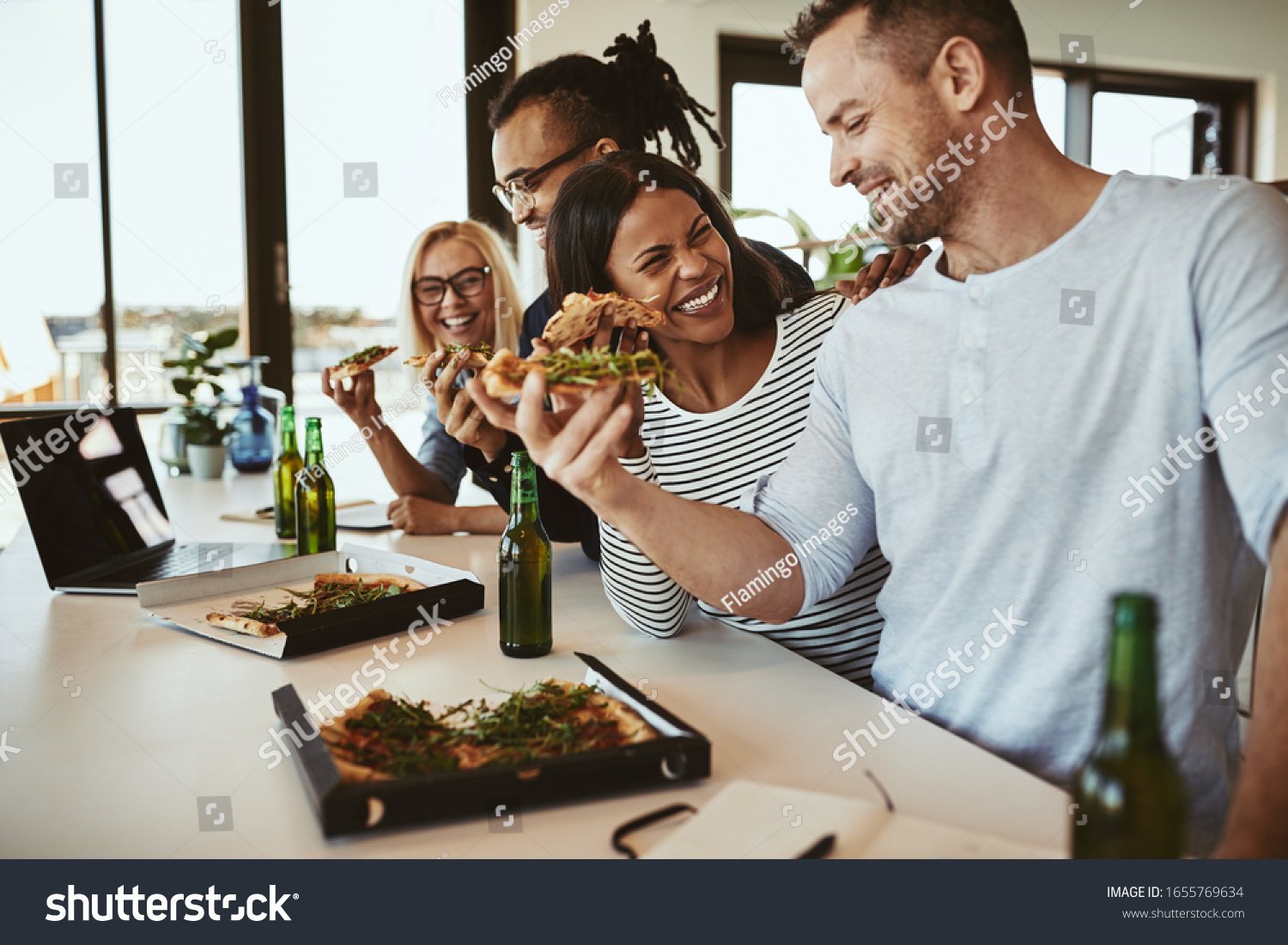 Diverse Group Laughing Businesspeople Eating Pizza Stock Photo ... Diverse Group Laughing Businesspeople Eating Pizza Stock Photo ...