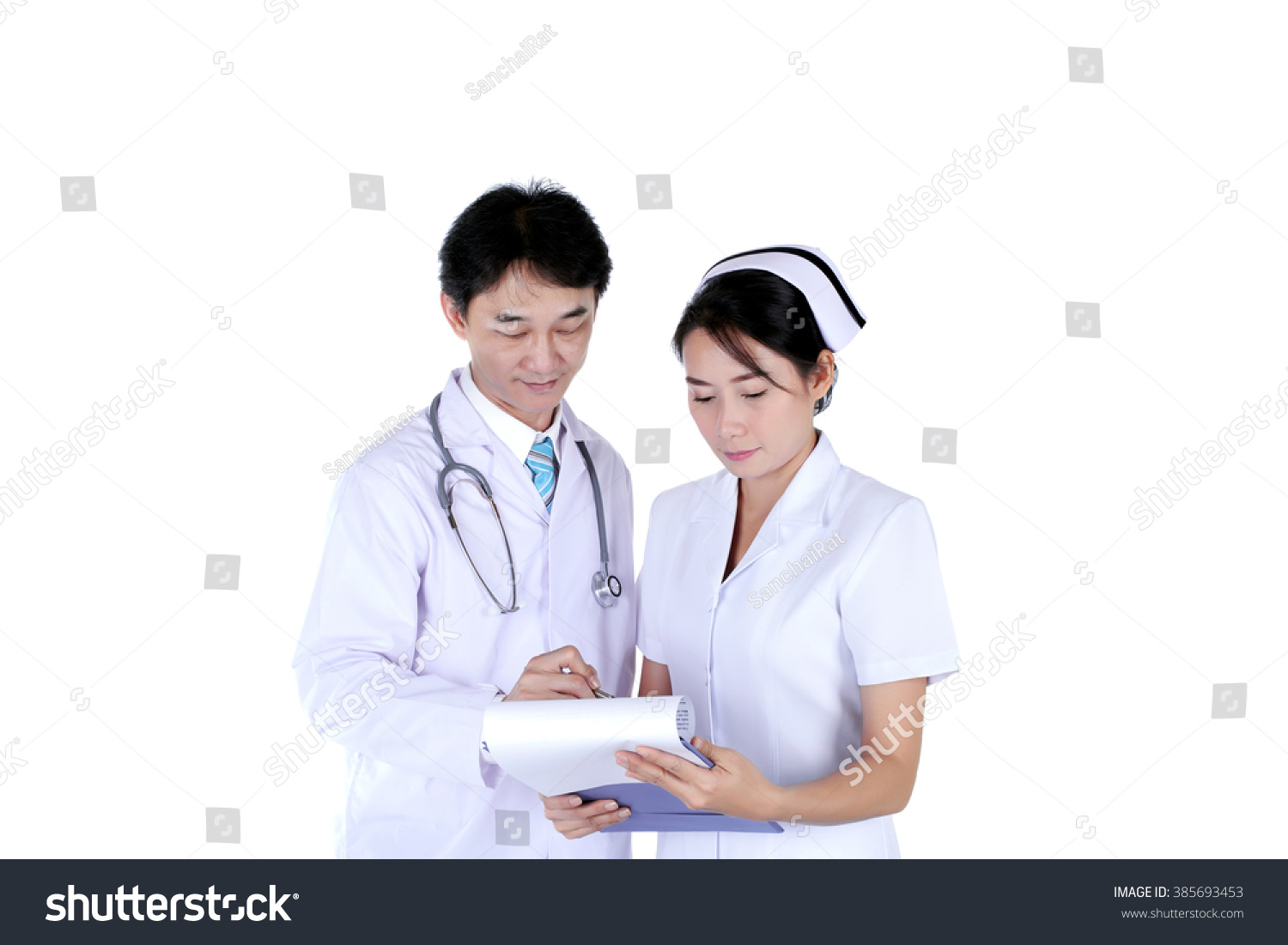 Doctor Nurse Reviewing Medical Chart Isolated Foto stock 385693453 ... Doctor Nurse Reviewing Medical Chart Isolated Foto stock 385693453 ...
