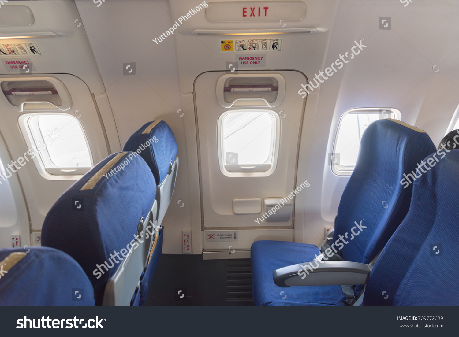 Airplane emergency exit door Images, Stock Photos & Vectors | Shutterstock Airplane emergency exit door Images, Stock Photos & Vectors | Shutterstock