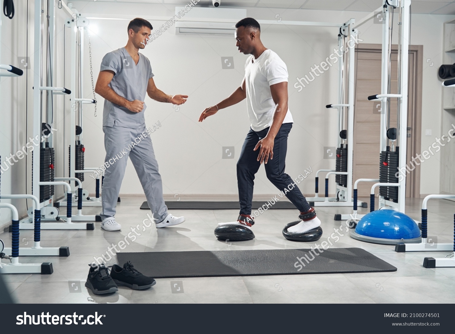 Focused Guy Using Training Device During Stock Photo 2100274501 ...