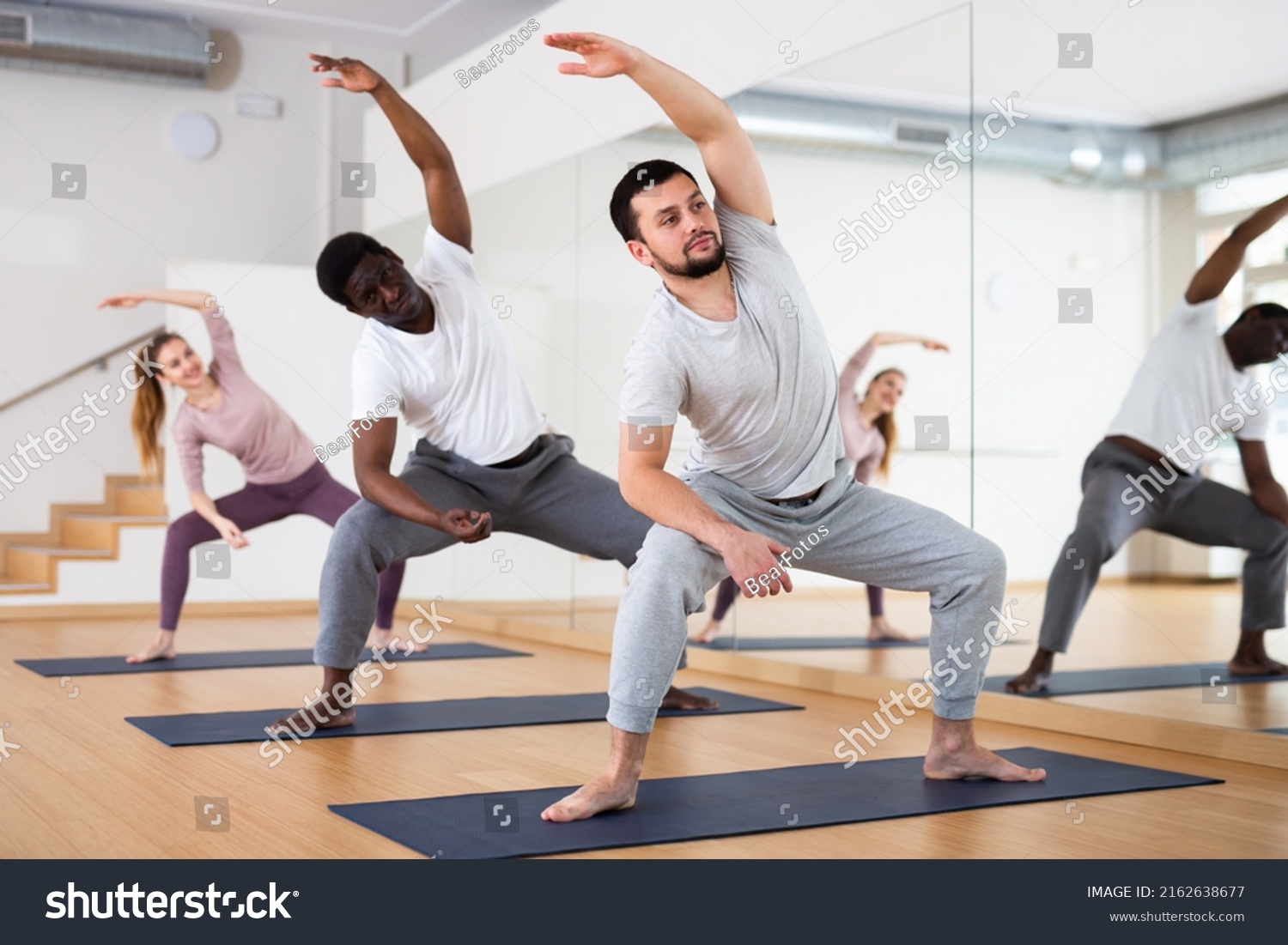 Group People Doing Stretching Exercises Squatting Stock Photo ... Group People Doing Stretching Exercises Squatting Stock Photo ...