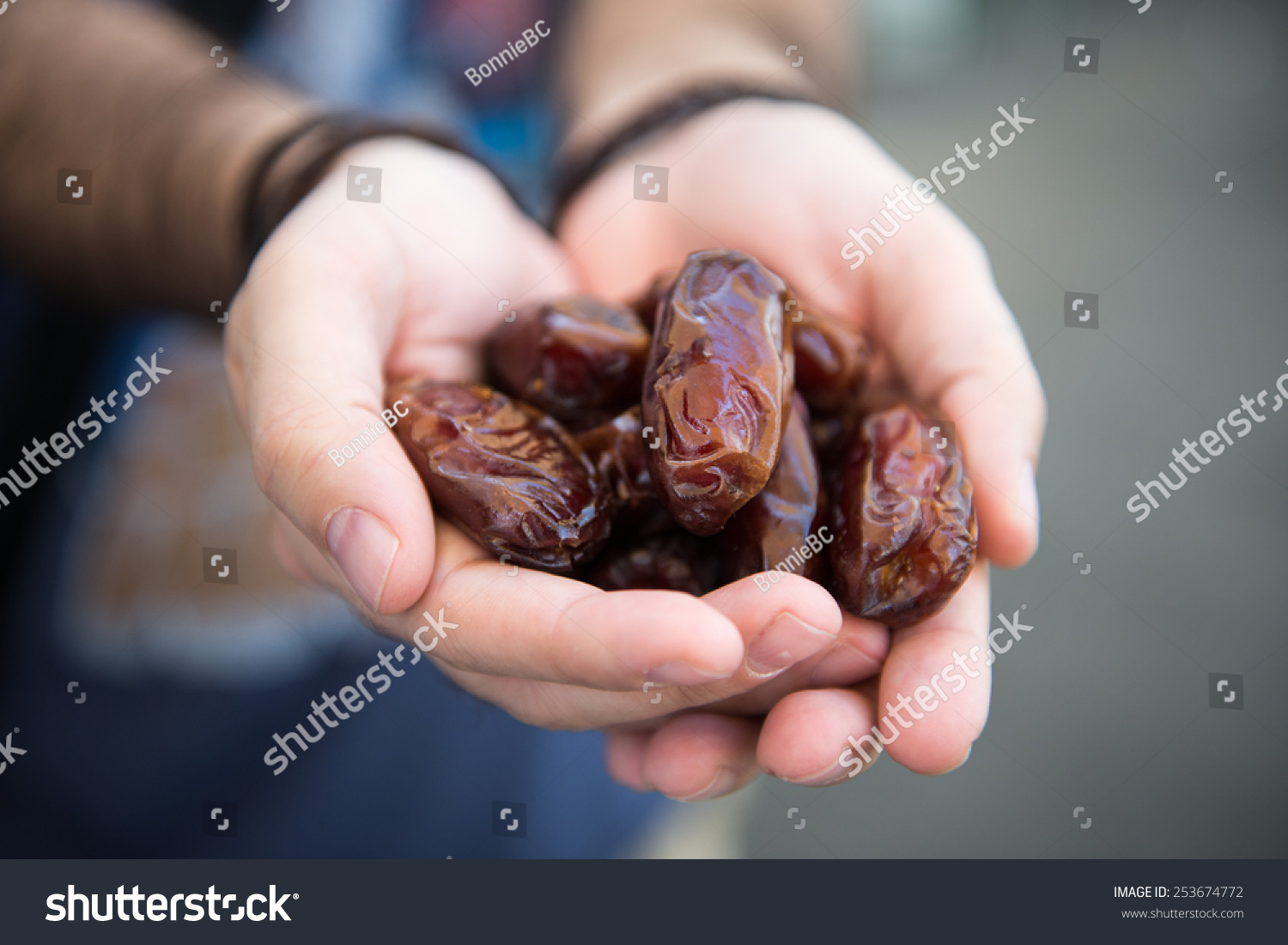 Hands Holding Middle Eastern Dates Stock Photo 253674772 | Shutterstock
