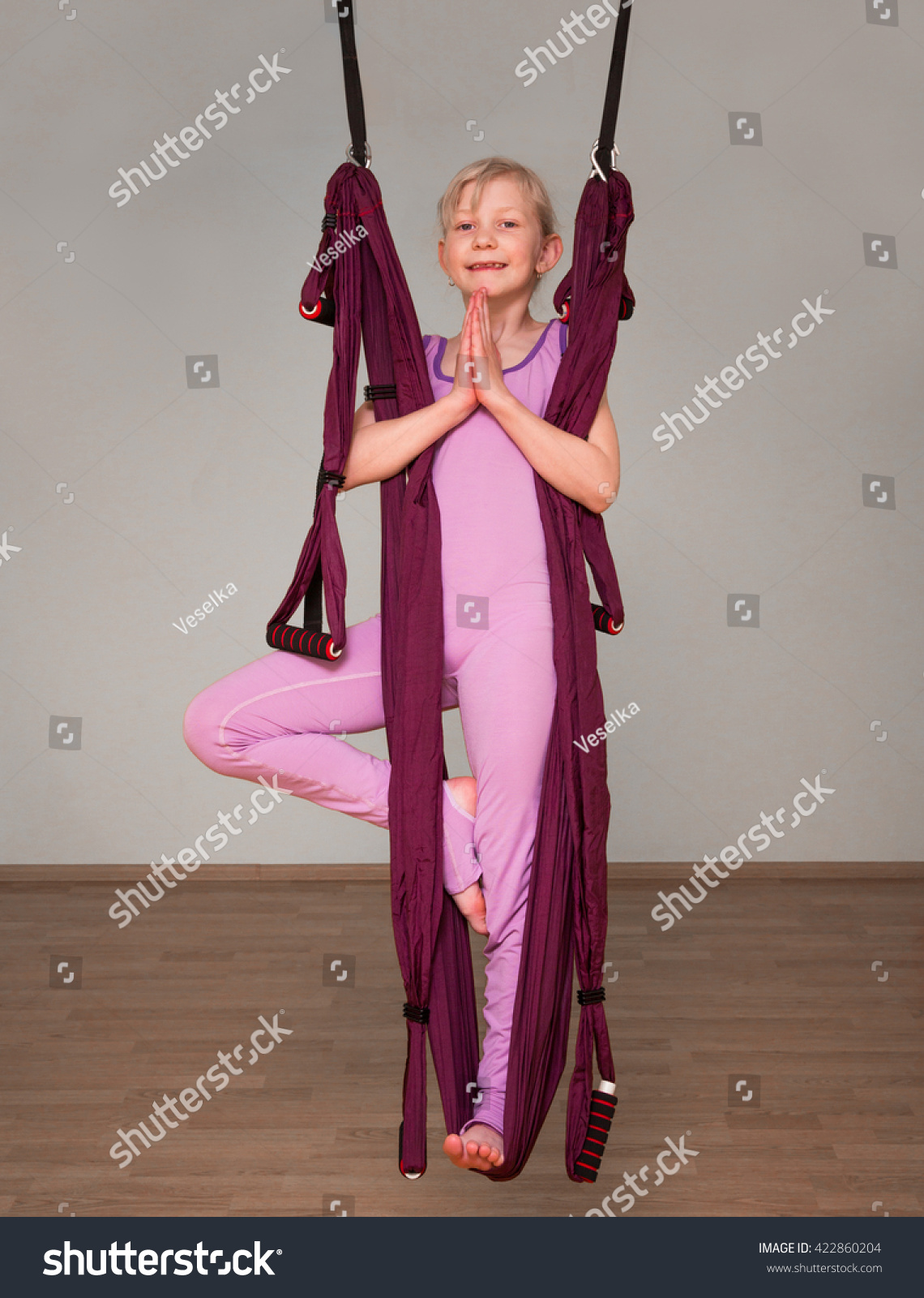 Little Girl Making Aerial Yoga Exercises Stock Photo 422860204 ... Little Girl Making Aerial Yoga Exercises Stock Photo 422860204 ...