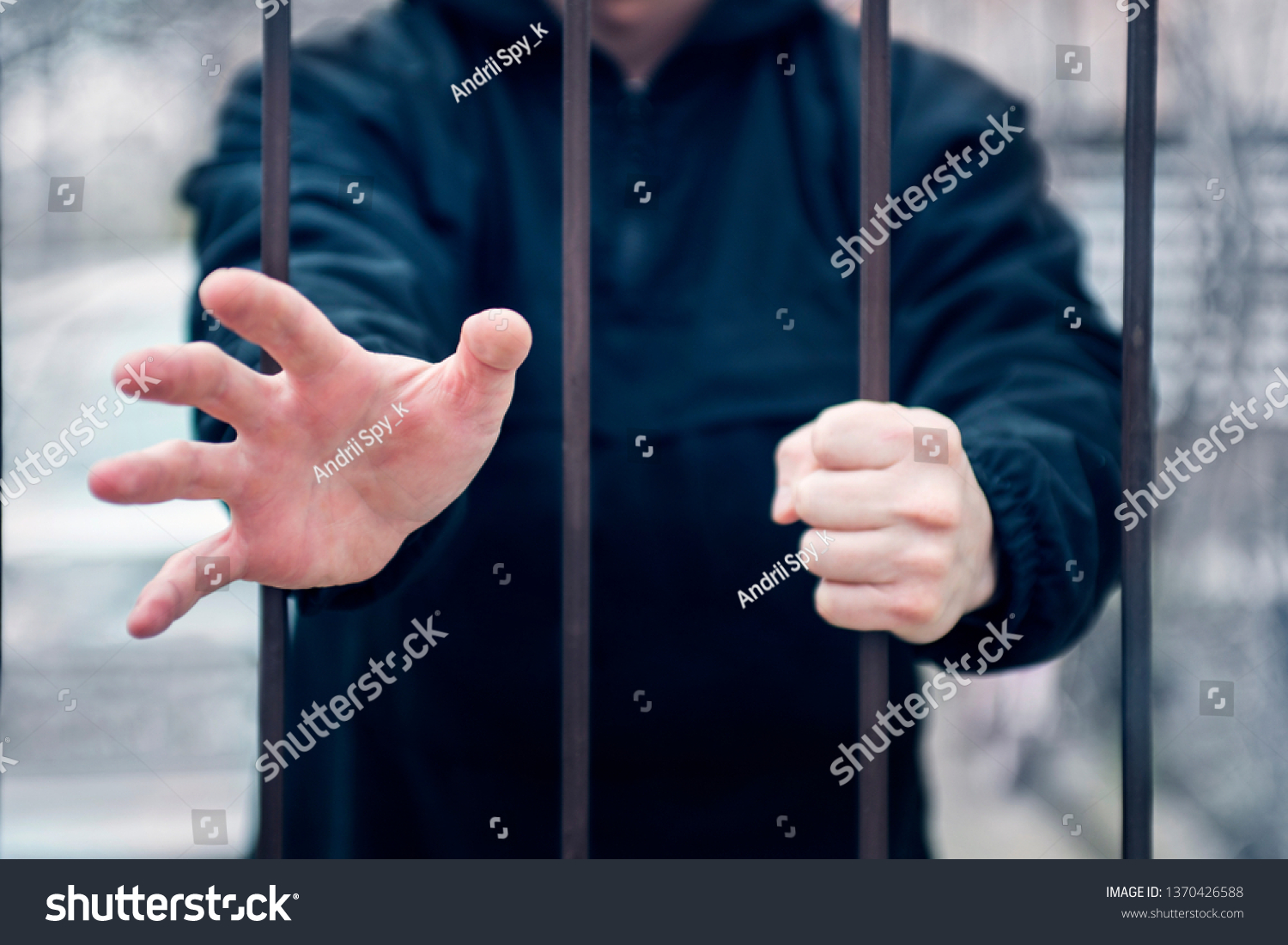 Man Extends His Hand Help Cage Stock Photo 1370426588 | Shutterstock Man Extends His Hand Help Cage Stock Photo 1370426588 | Shutterstock