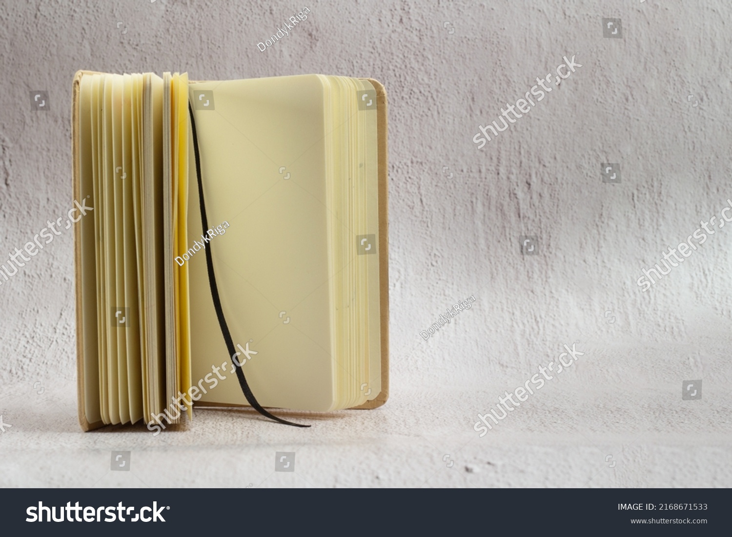 Open Note Book On Rustic Background Stock Photo 2168671533 | Shutterstock