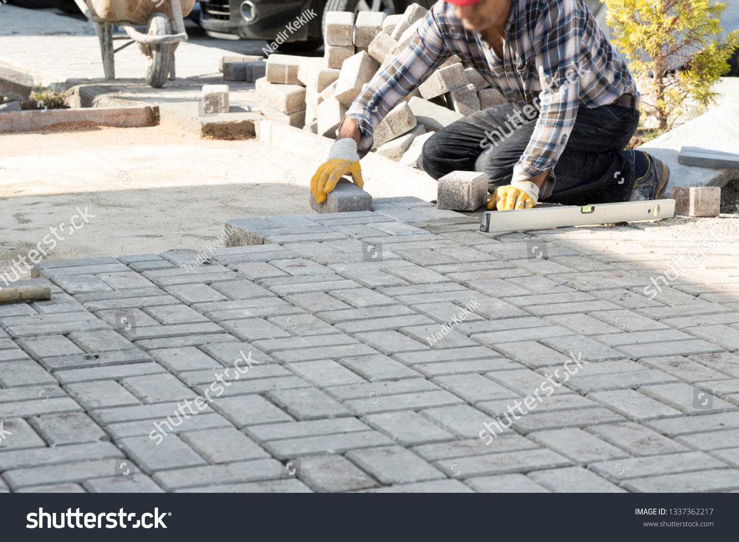 Paving Stone Worker Putting Down Paver Stock Photo 1337362217 ... Paving Stone Worker Putting Down Paver Stock Photo 1337362217 ...