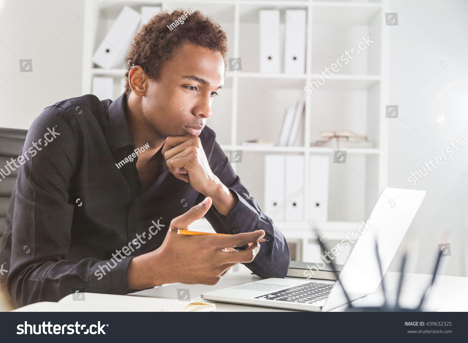 Pensive Black Businessman Working On Project Stock Photo 439632325 ... Pensive Black Businessman Working On Project Stock Photo 439632325 ...