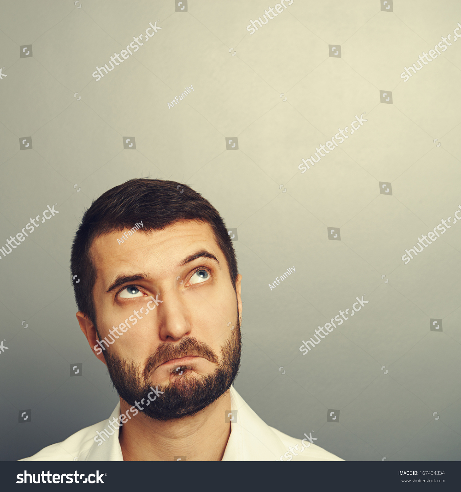 Perplexed Man Looking Empty Copyspace Stock Photo (Edit Now) 167434334