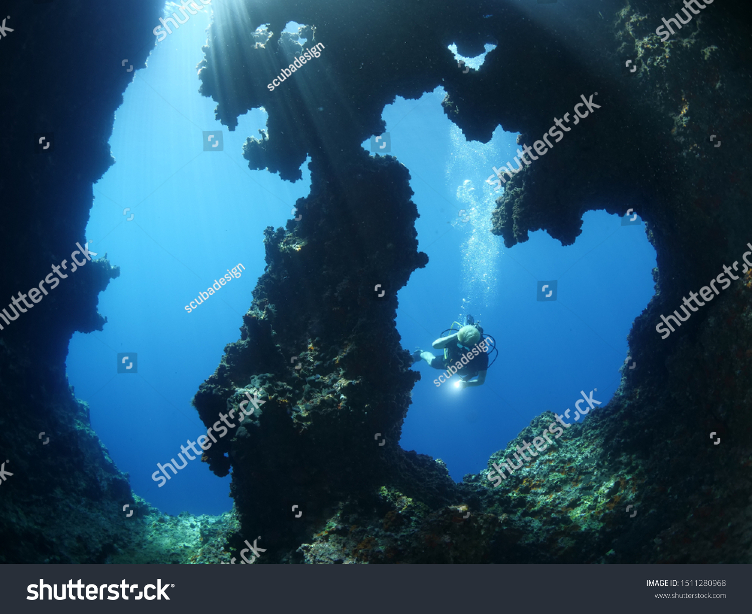 Scuba Diver Exploring Discovering Caves Underwater Stock Photo ... Scuba Diver Exploring Discovering Caves Underwater Stock Photo ...