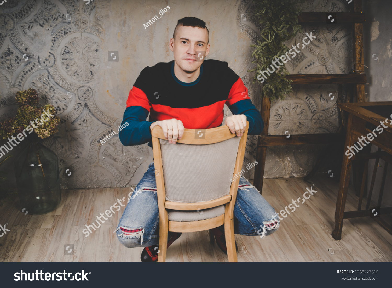Serious Thoughtful Man Sitting On Chair ภาพสต็อก 1268227615 | Shutterstock Serious Thoughtful Man Sitting On Chair ภาพสต็อก 1268227615 | Shutterstock