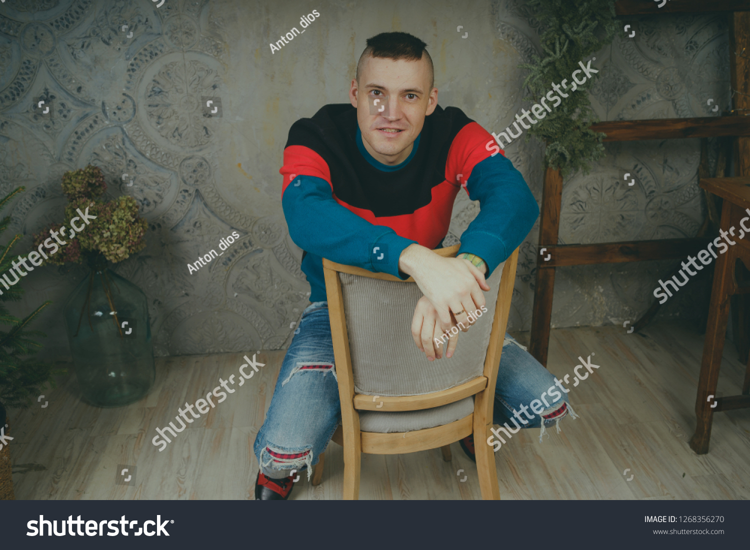 Serious Thoughtful Man Sitting On Chair Stock Photo 1268356270 ... Serious Thoughtful Man Sitting On Chair Stock Photo 1268356270 ...