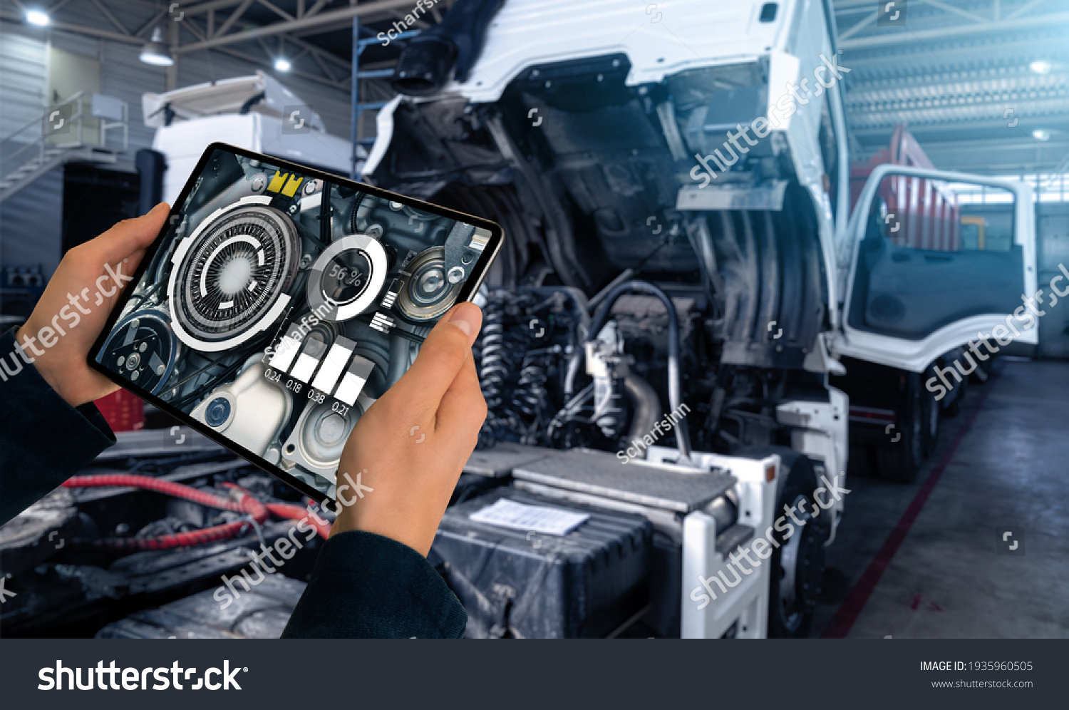 Serviceman Repairing Truck Using Augmented Reality Stock Photo ... Serviceman Repairing Truck Using Augmented Reality Stock Photo ...