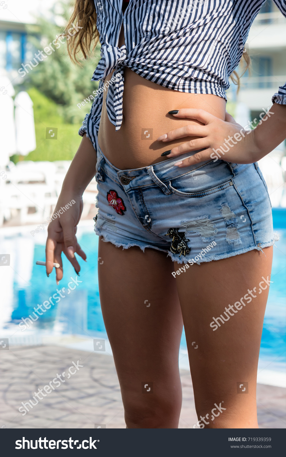 Sexy Woman Body Jean Shorts Cigarette Stock Photo 719339359 | Shutterstock Sexy Woman Body Jean Shorts Cigarette Stock Photo 719339359 | Shutterstock