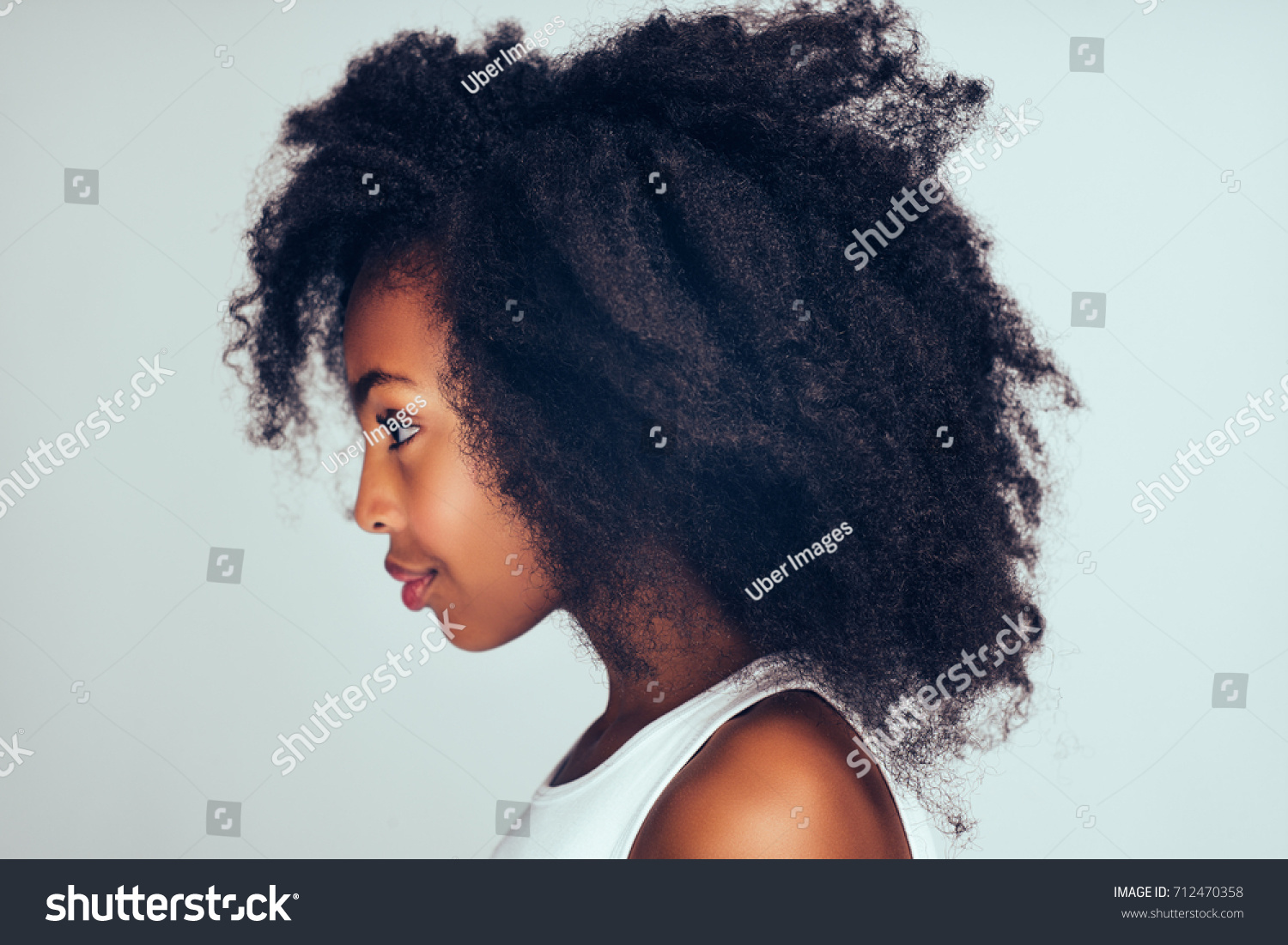 Smiling Young African Girl Long Curly Stock Photo (Edit Now) 712470358 Smiling Young African Girl Long Curly Stock Photo (Edit Now) 712470358