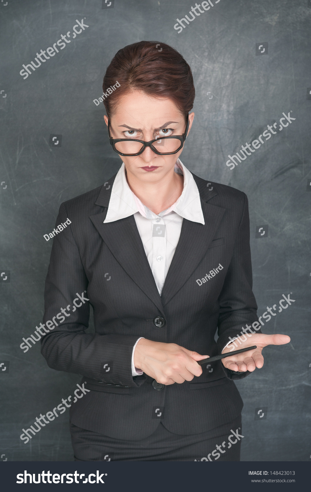 Strict Teacher With Pointer Stock Photo 148423013 : Shutterstock