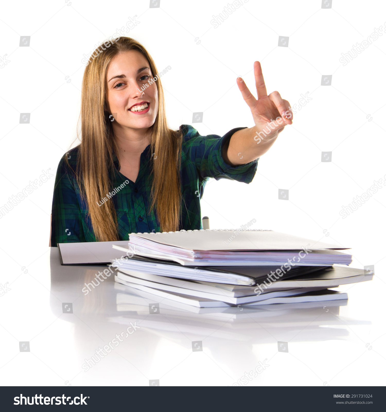Student Doing Victory Gesture While Studying Stock Photo (Edit Now ...
