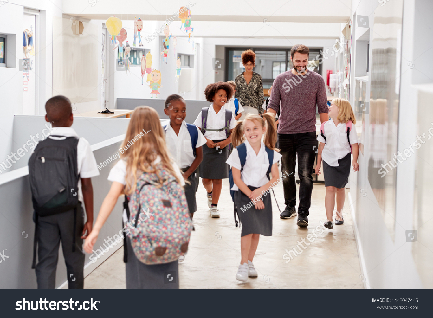 Teacher Pupils Walking Along Corridor Busy Stock Photo 1448047445 ... Teacher Pupils Walking Along Corridor Busy Stock Photo 1448047445 ...