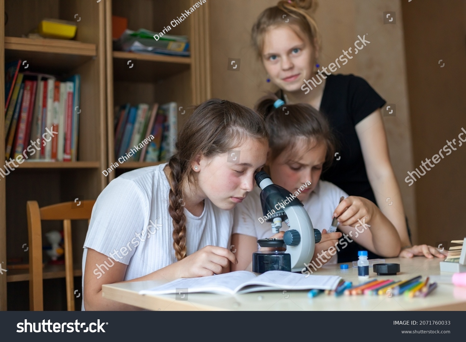 Three Sisters Learning Lessons Table Stock Photo 2071760033 | Shutterstock