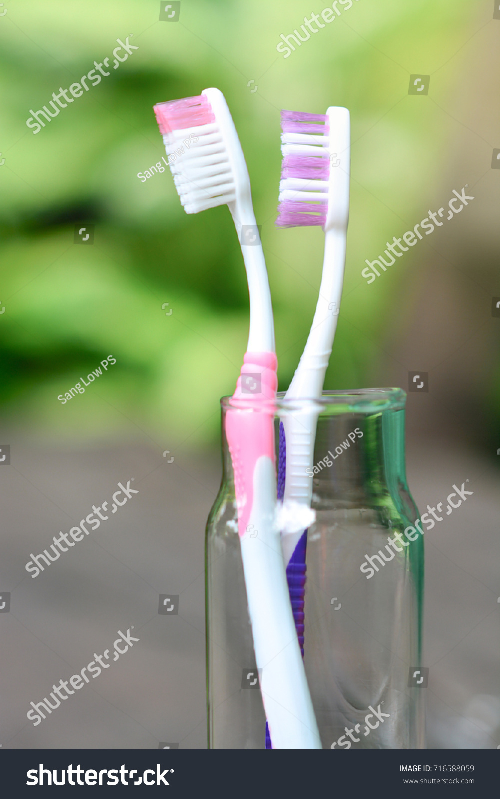 Toothbrushes Glass Blurred Light Green Background Stock Photo (Edit Now ... Toothbrushes Glass Blurred Light Green Background Stock Photo (Edit Now ...
