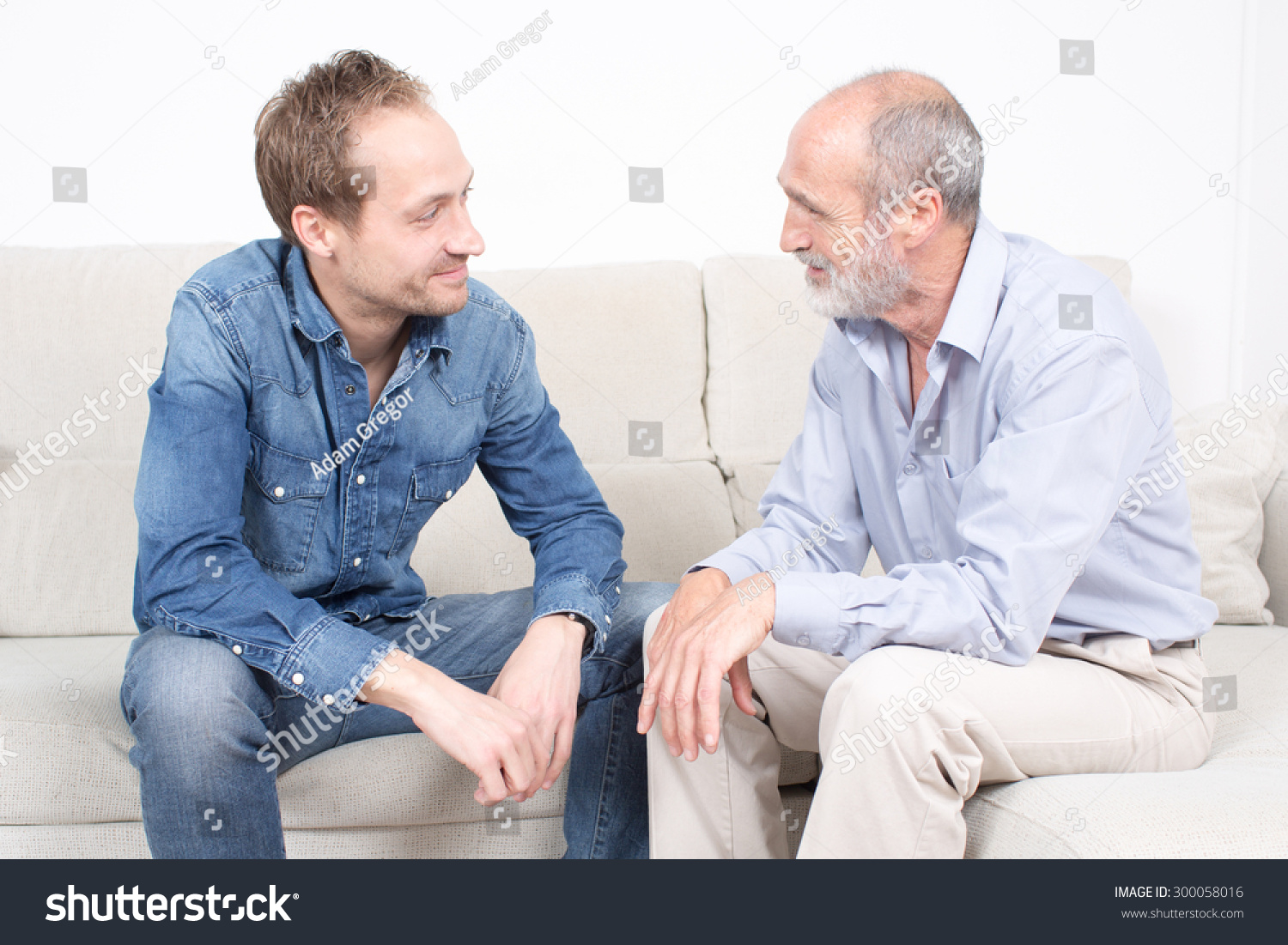 Two Men Talking Stock Photo (Edit Now) 300058016