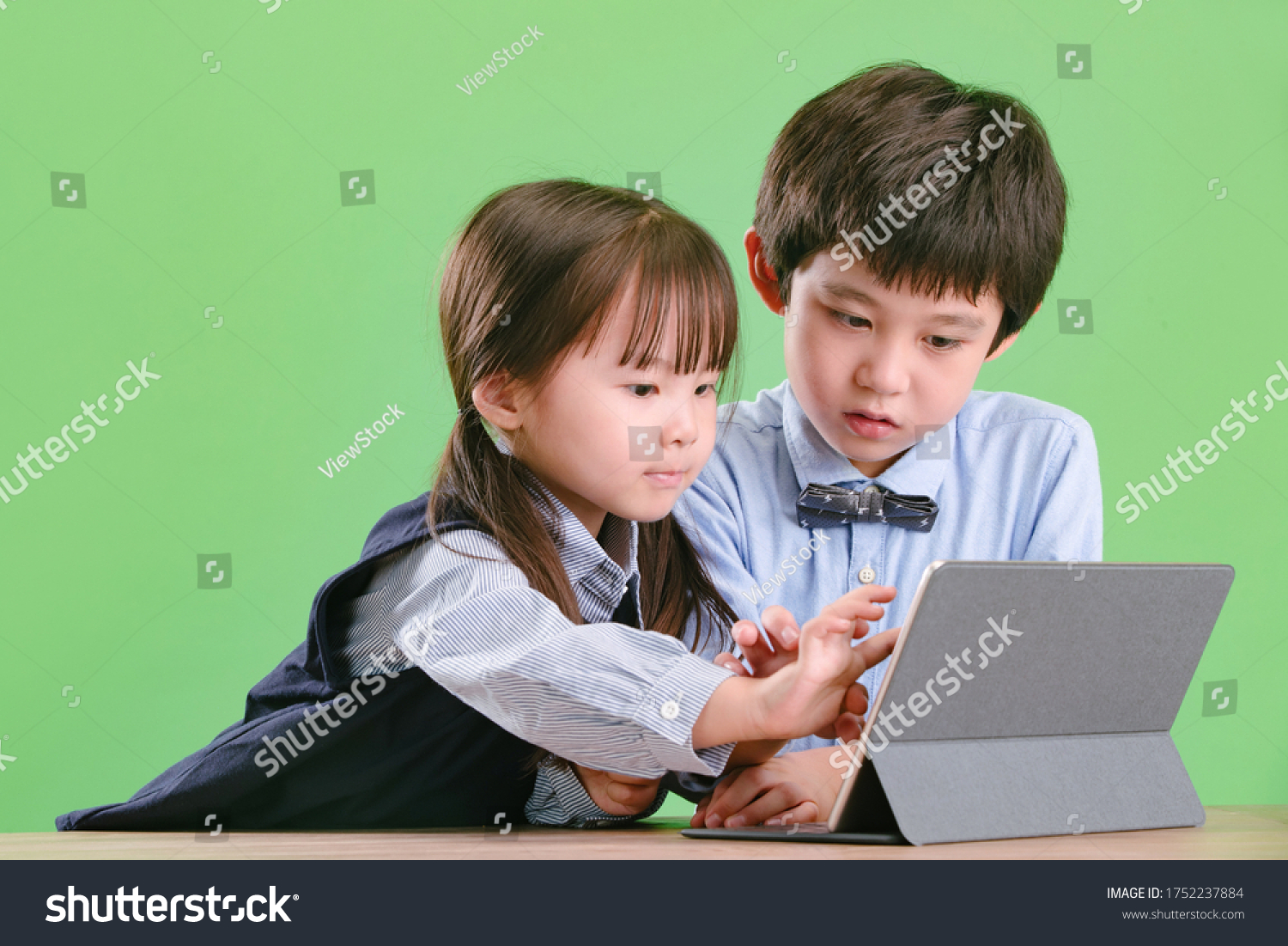 Two Pals Use Tablet Computers Stock Photo 1752237884 | Shutterstock