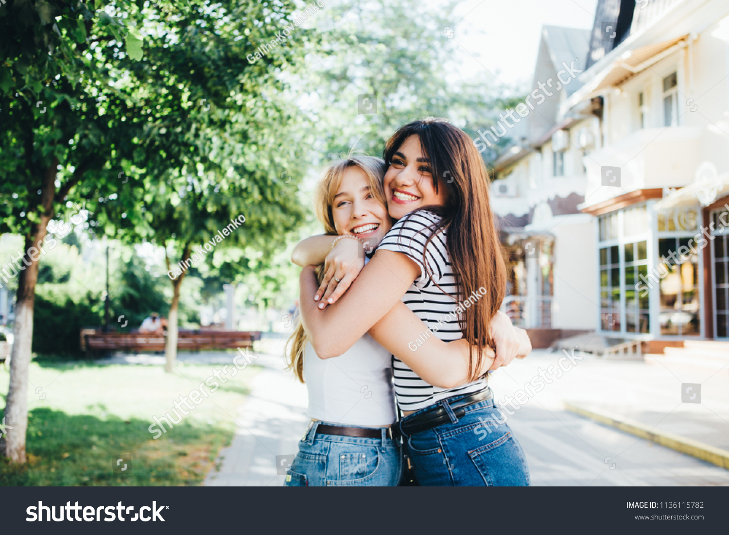 Two Young Girls Hug Laugh Stock Photo 1136115782 | Shutterstock Two Young Girls Hug Laugh Stock Photo 1136115782 | Shutterstock