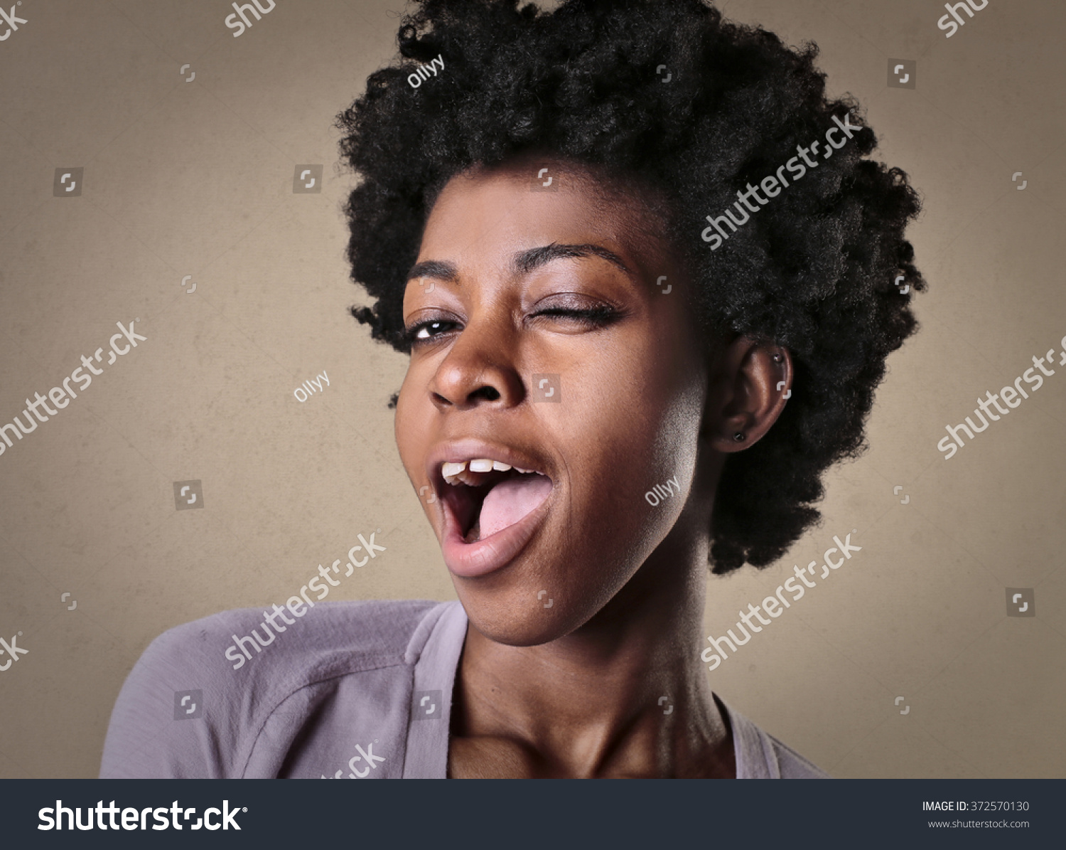 Winking Woman Stock Photo 372570130 : Shutterstock Winking Woman Stock Photo 372570130 : Shutterstock