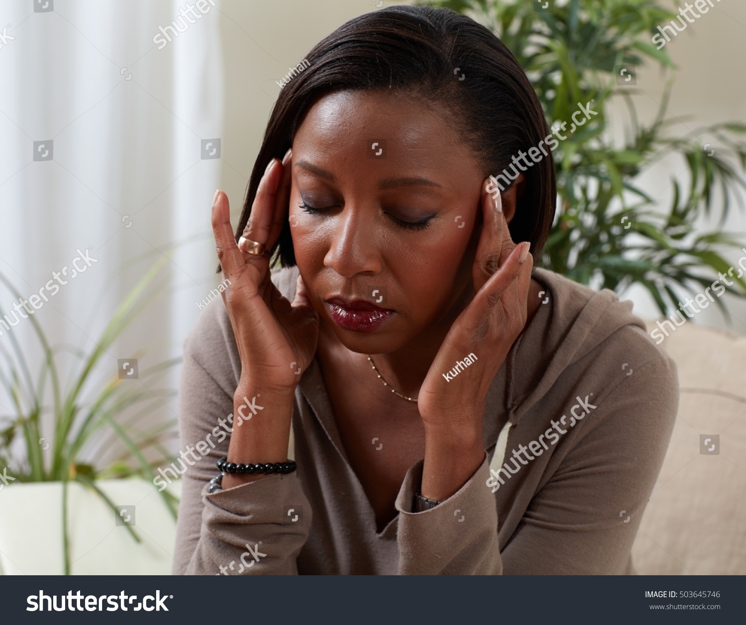 Woman Migrain. Stock Photo 503645746 : Shutterstock Woman Migrain. Stock Photo 503645746 : Shutterstock