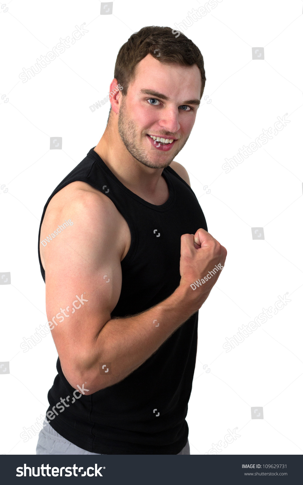 Young Attractive Man Flexing His Biceps Stock Photo 109629731 ... Young Attractive Man Flexing His Biceps Stock Photo 109629731 ...