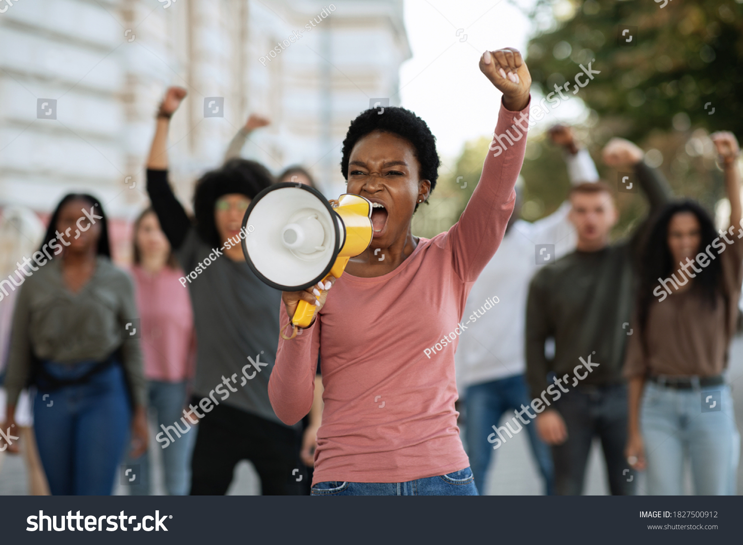 Young Black Woman Megaphone Leading Group Stock Photo (Edit Now) 1827500912 Young Black Woman Megaphone Leading Group Stock Photo (Edit Now) 1827500912