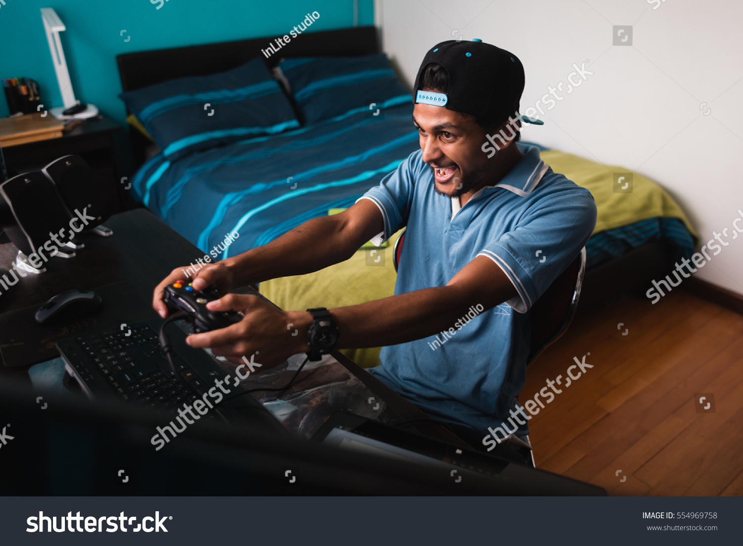Young Indian Guy Using Computer Stock Photo (Edit Now) 554969758
