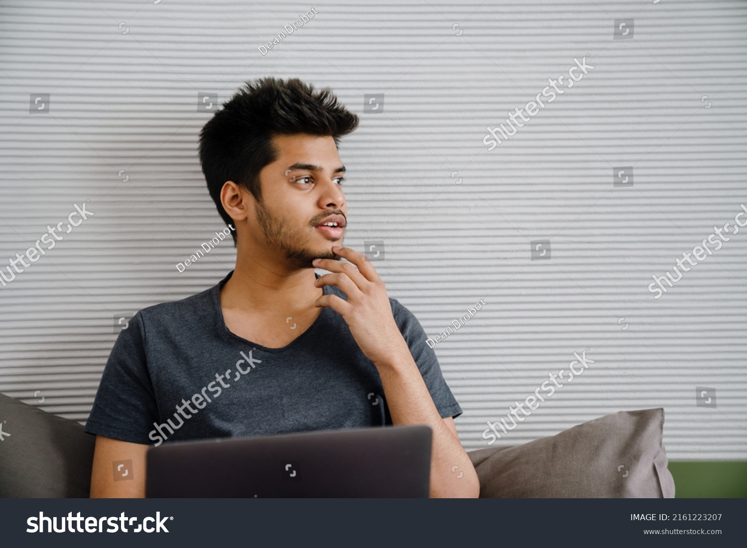 Young Indian Thoughtful Man Touching Chin Stock Photo 2161223207 ... Young Indian Thoughtful Man Touching Chin Stock Photo 2161223207 ...